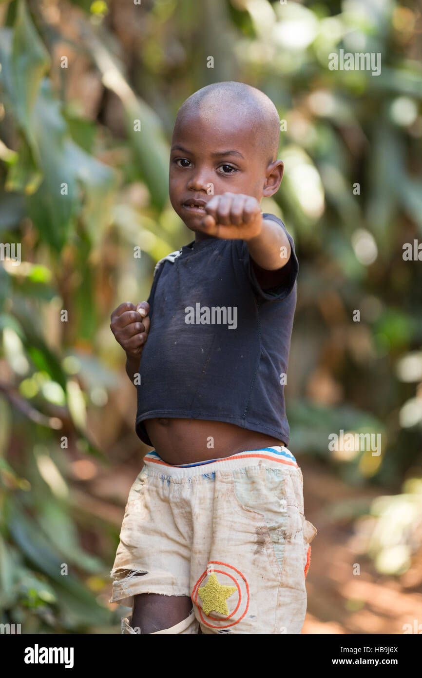 Boy torn clothes hi-res stock photography and images - Alamy