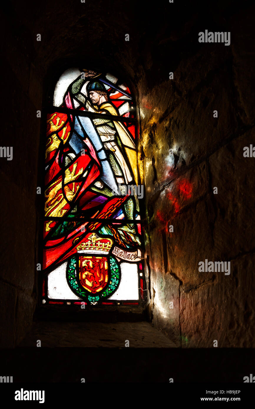 Sunlight streams through stained glass window showing William Wallace ...