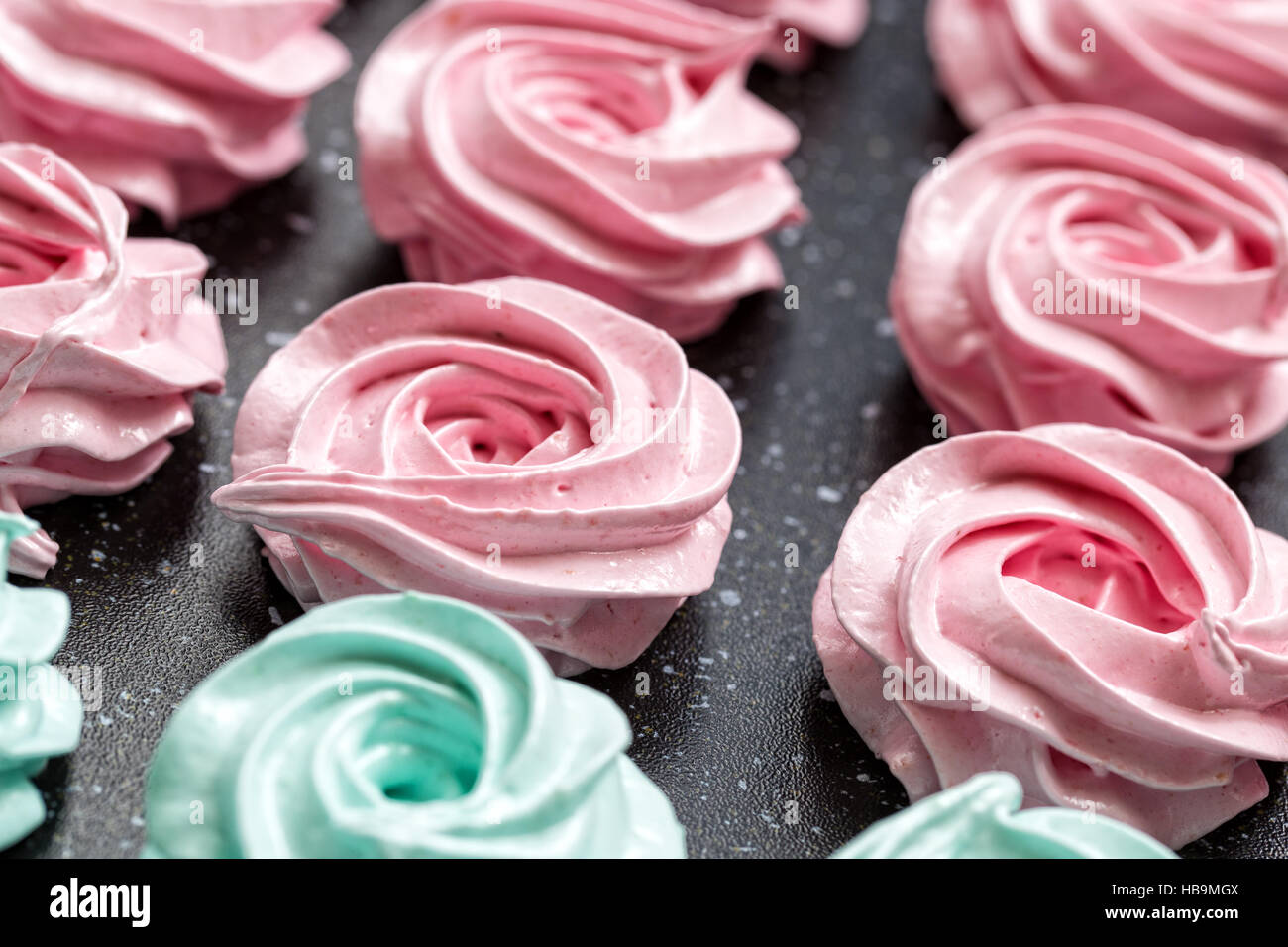 Handmade Colored Zephyr on Black Table Stock Photo - Alamy