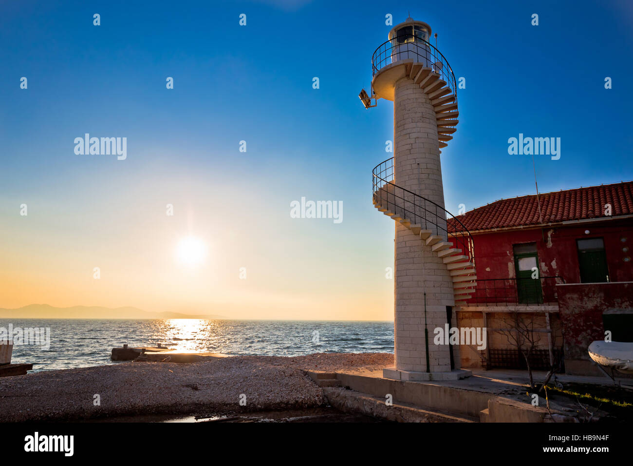 Lighthouse in Zadar at sunset Stock Photo - Alamy