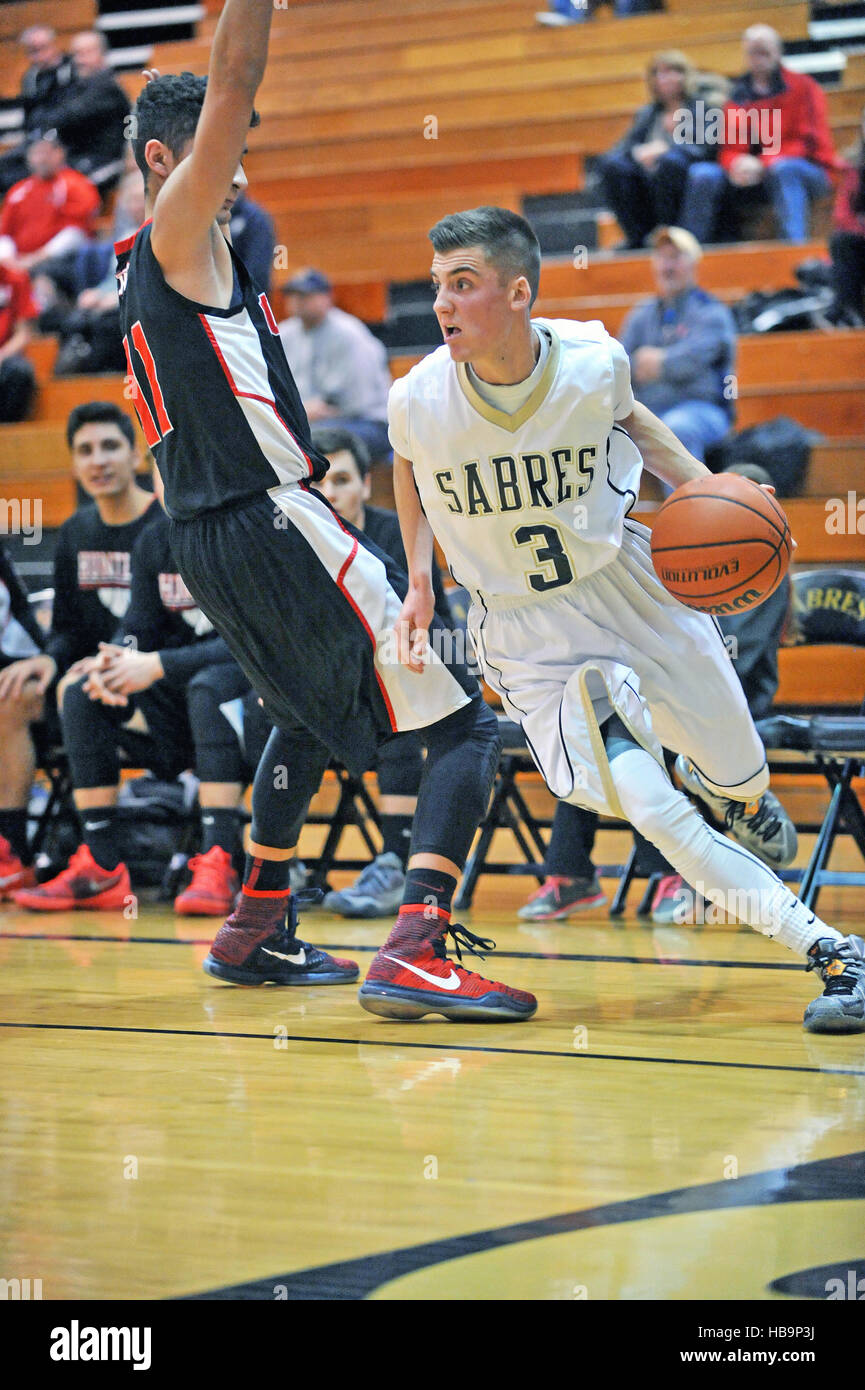 Player dribbling out of an offensive corner and past a defender while ...