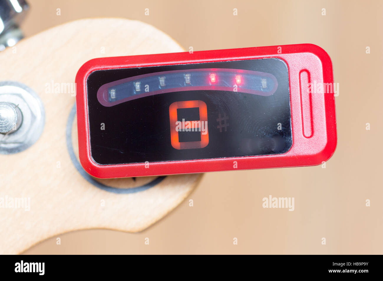 Series of tuning a guitar, A, out of tuning by a digital tuner Stock ...