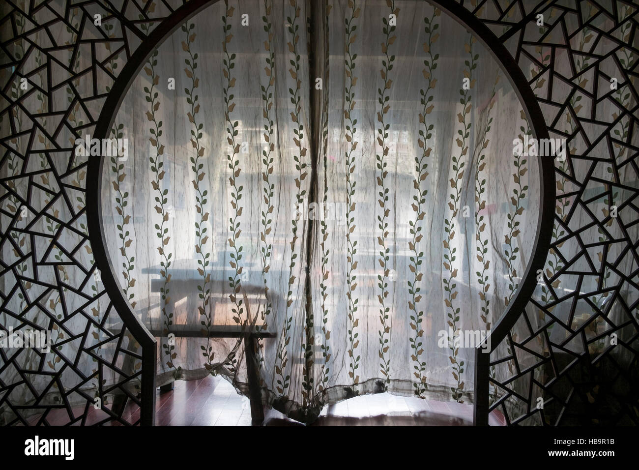 Round entrance to restaurant sitting area wuzhen china Stock Photo - Alamy