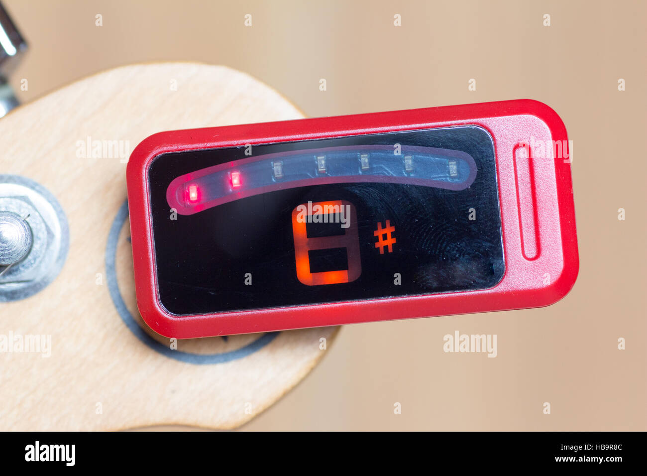 Series of tuning a guitar, C#, out of tuning by a digital tuner Stock ...