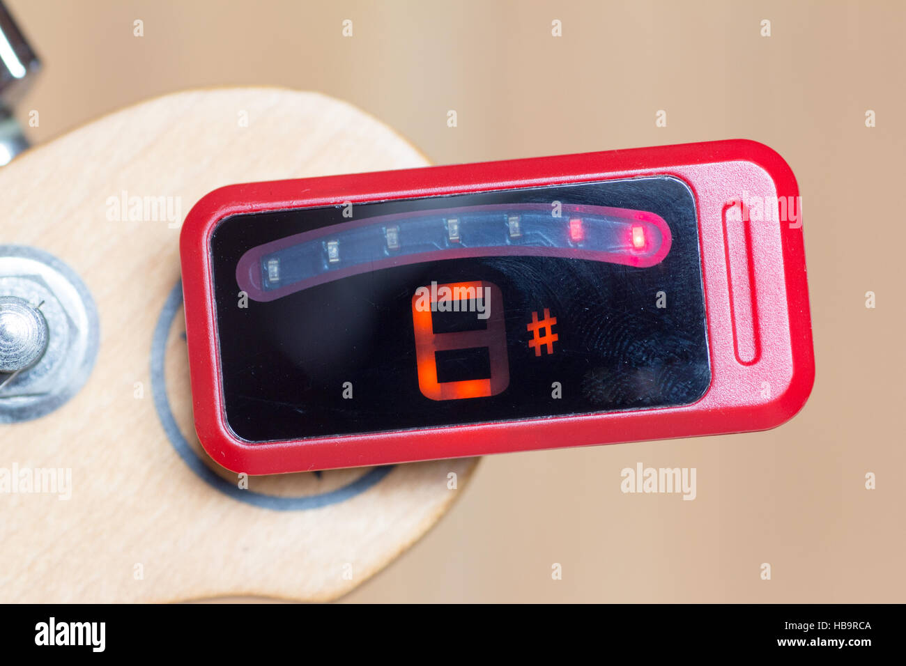 Series of tuning a guitar, C#, out of tuning by a digital tuner Stock ...