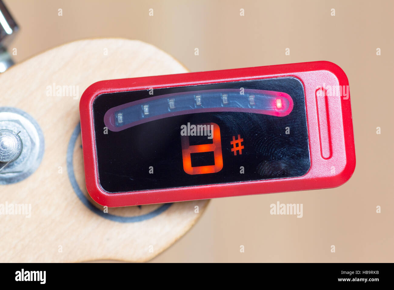 Series of tuning a guitar, D#, out of tuning by a digital tuner Stock ...