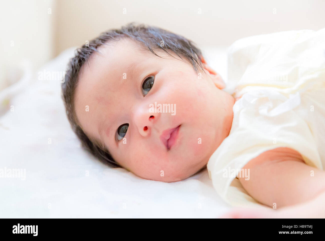 Smile Newborn baby Stock Photo - Alamy