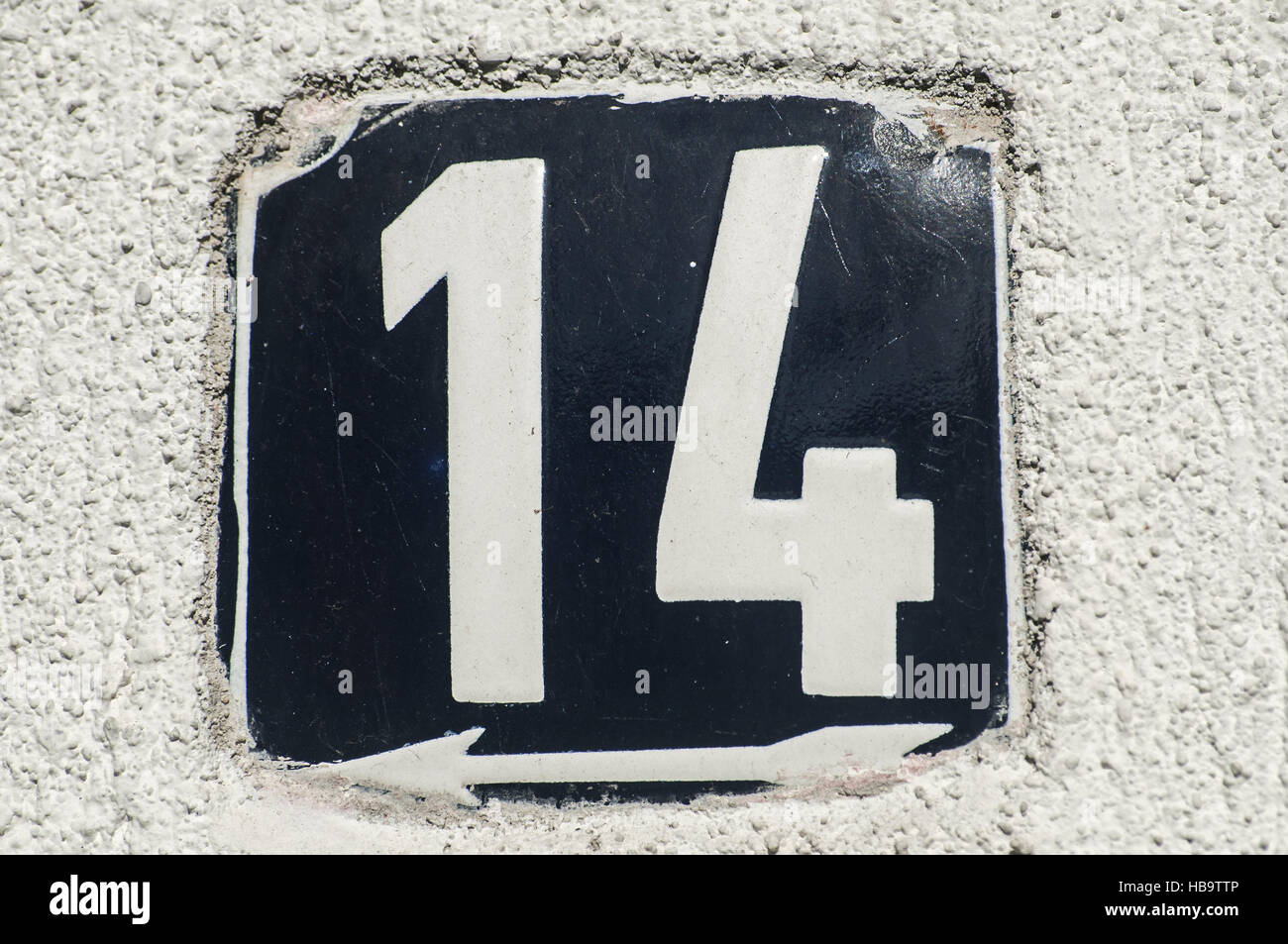 Weathered enameled plate number 14 Stock Photo - Alamy
