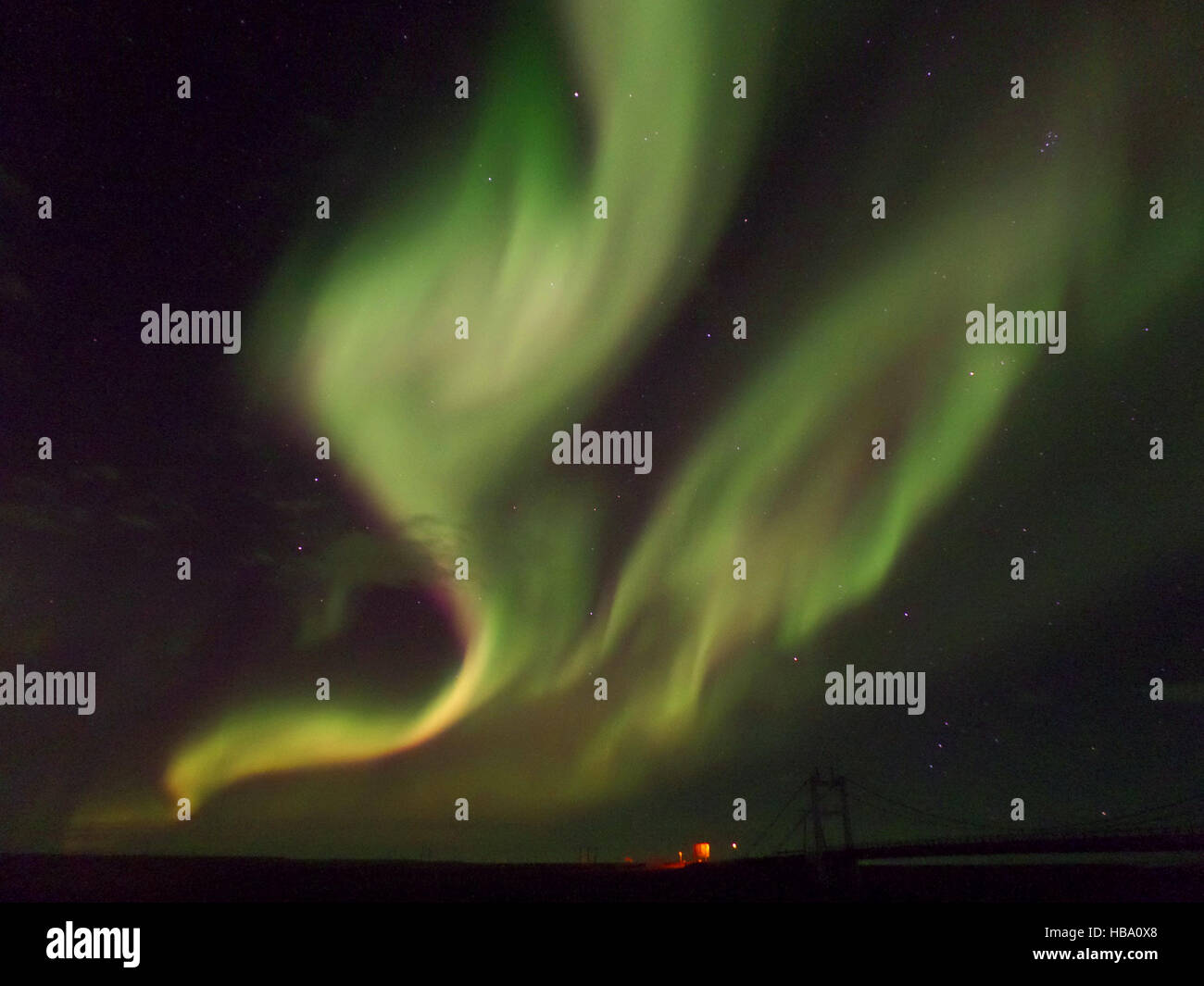 Breathtaking Green and Pink Color Northern Lights Dancing over the ...