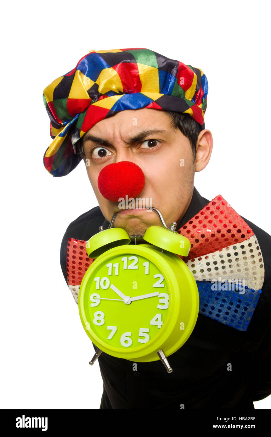 Funny clown with clock isolated on white Stock Photo - Alamy