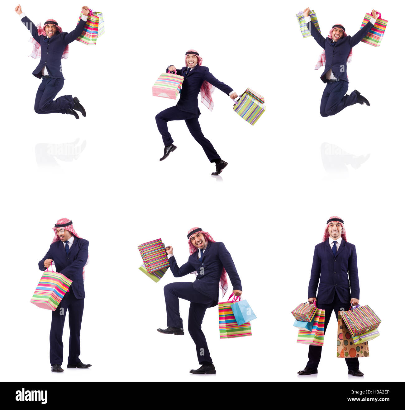 Arab man with shopping gifts on white Stock Photo - Alamy