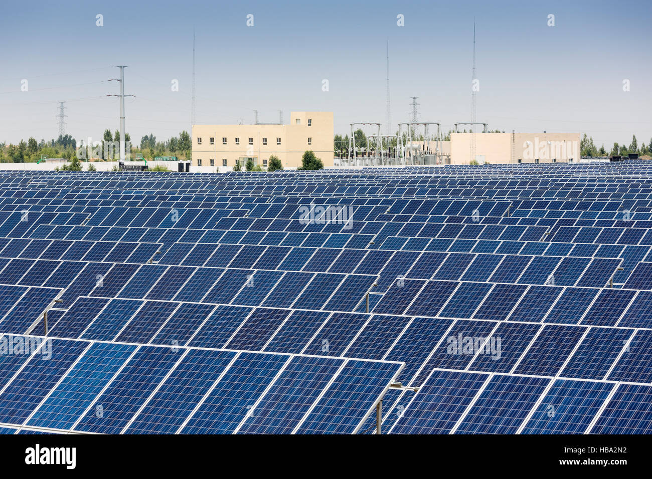 solar panels under blue sky Stock Photo - Alamy