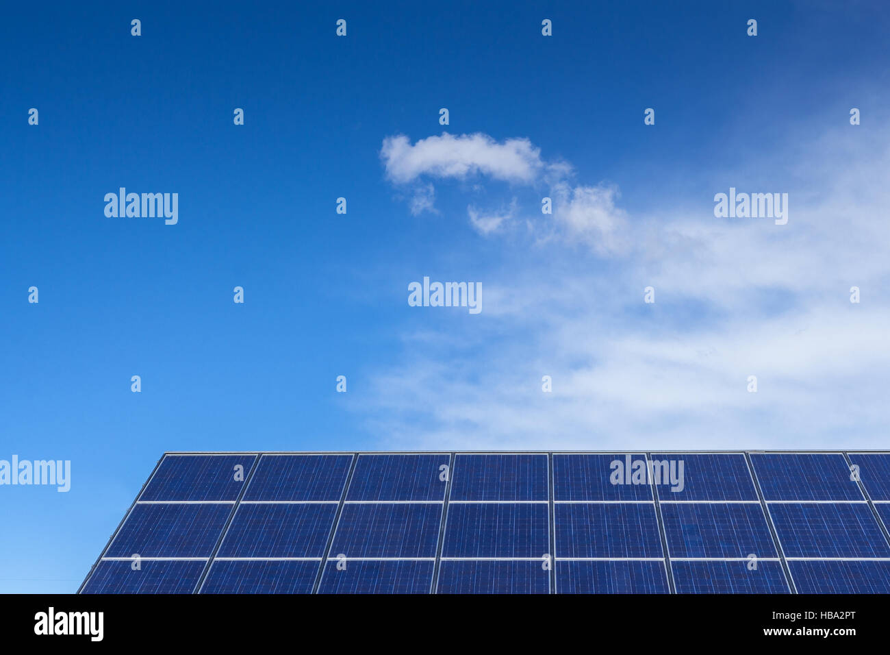 Solar panel against blue sky Stock Photo - Alamy