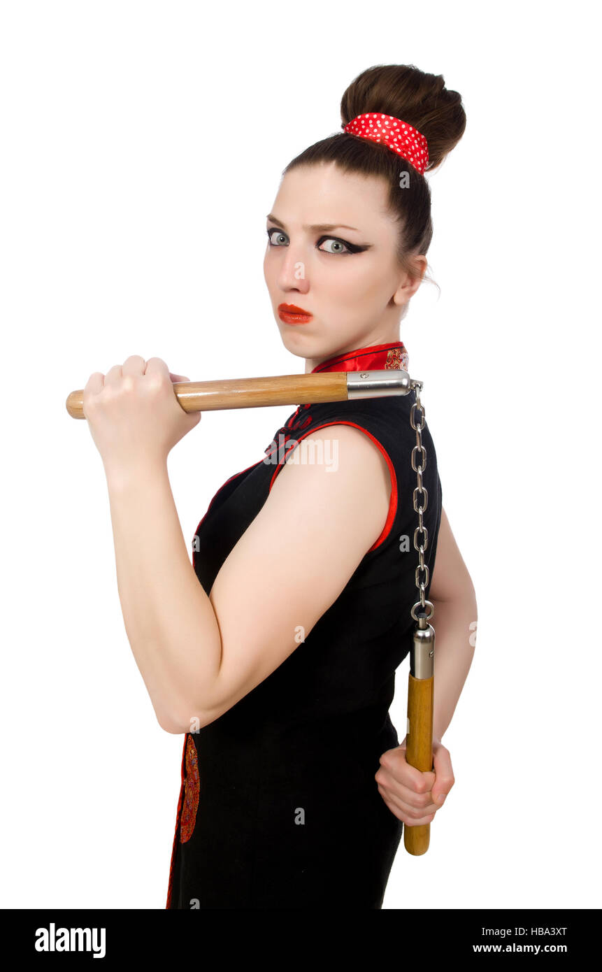 Funny woman with nunchucks isolated on white Stock Photo - Alamy