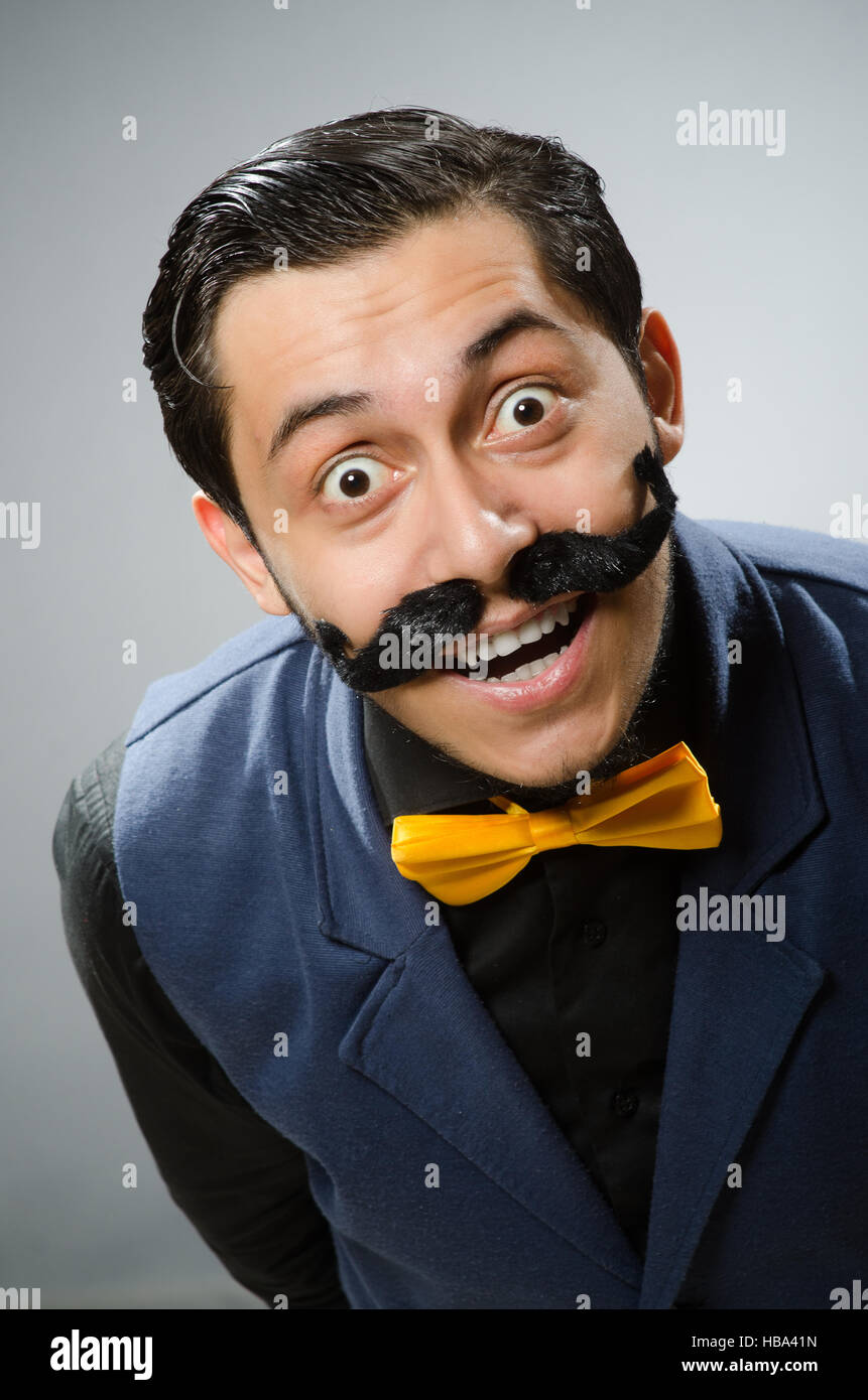 Funny man against dark background Stock Photo - Alamy