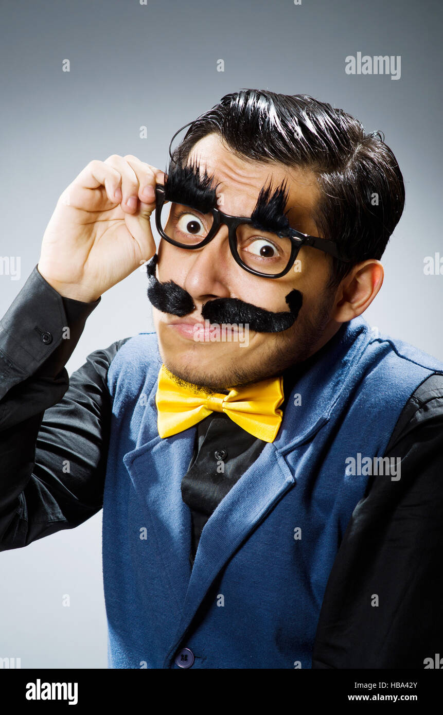 Funny man against dark background Stock Photo - Alamy