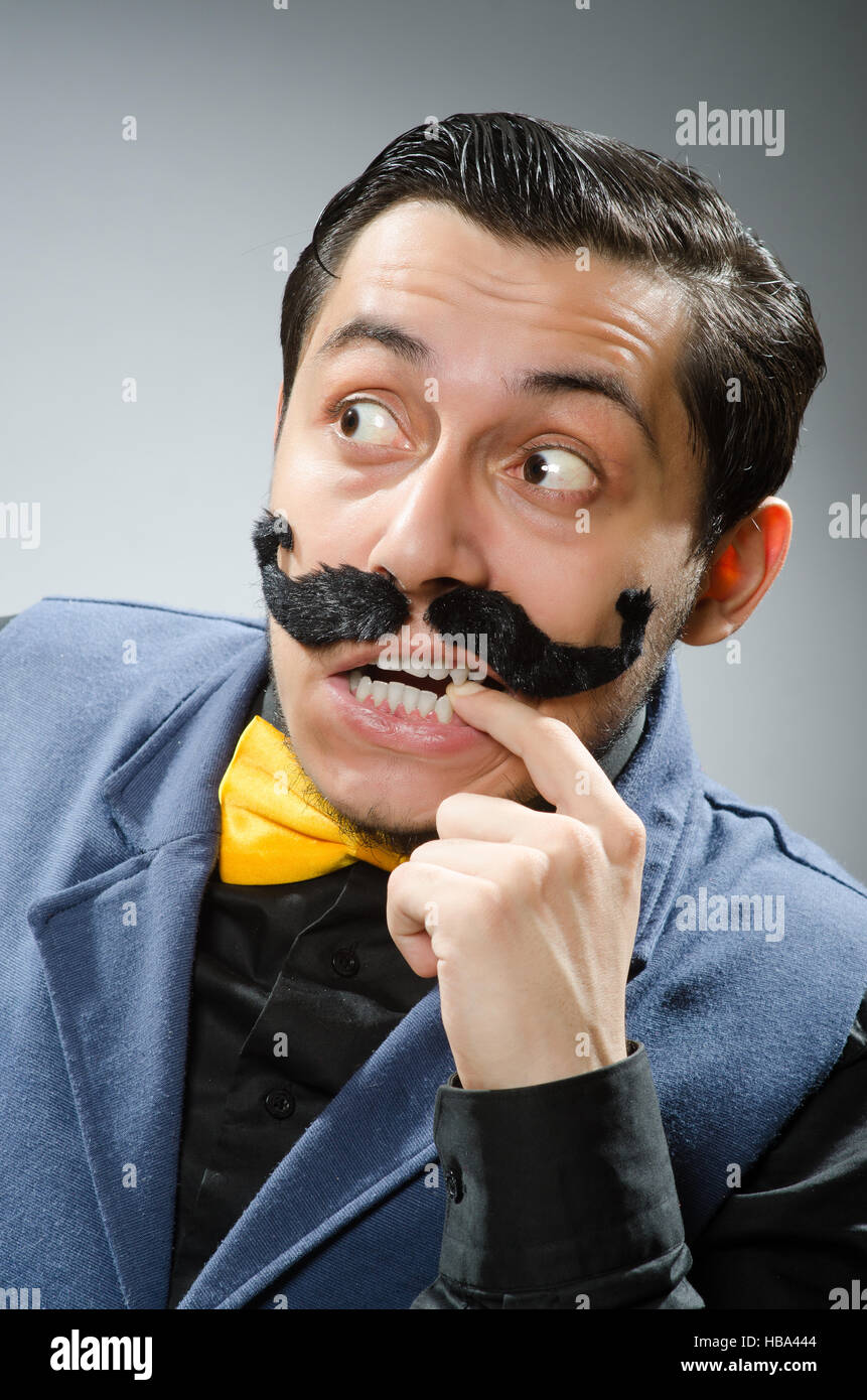 Funny man against dark background Stock Photo - Alamy