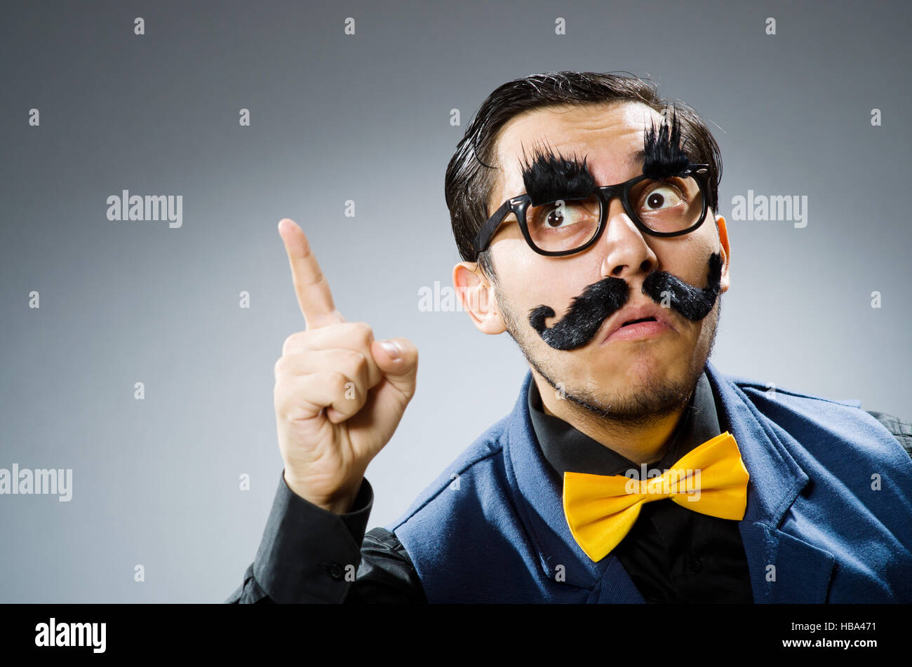 Funny man against dark background Stock Photo - Alamy