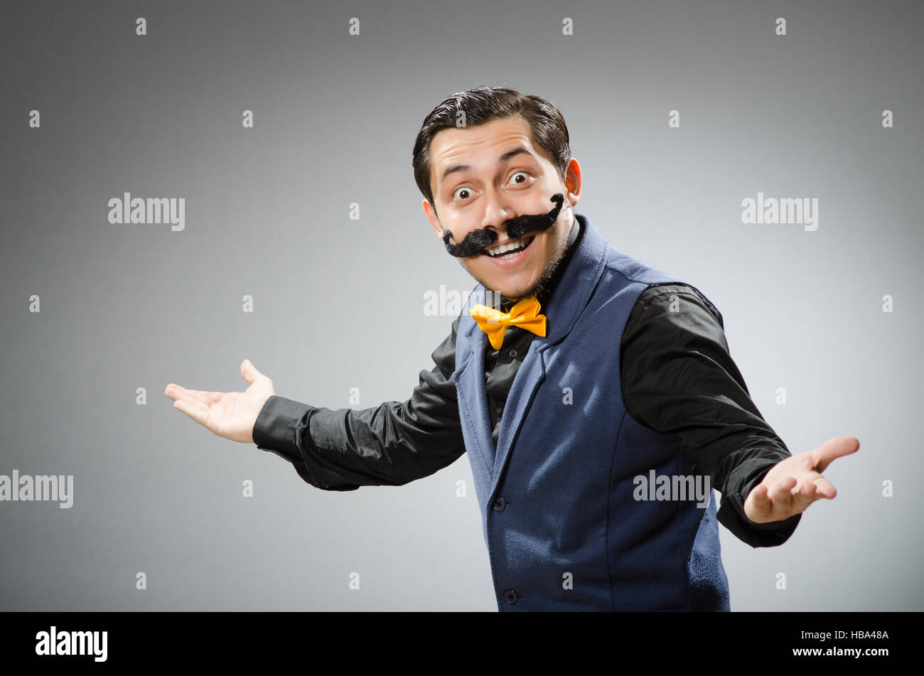 Funny man against dark background Stock Photo - Alamy