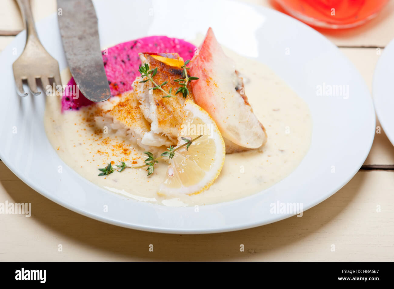 sea bream fillet butter pan fried Stock Photo - Alamy