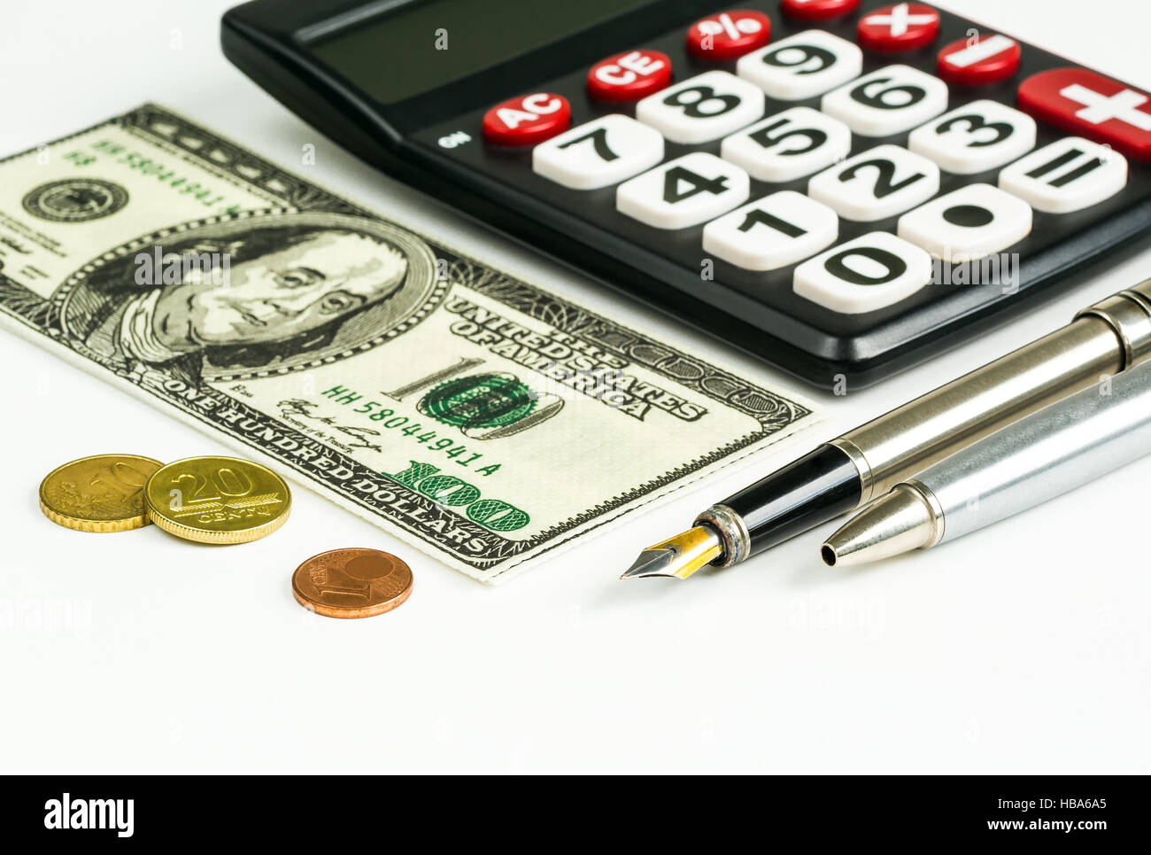 calculator; coins, pen Stock Photo - Alamy