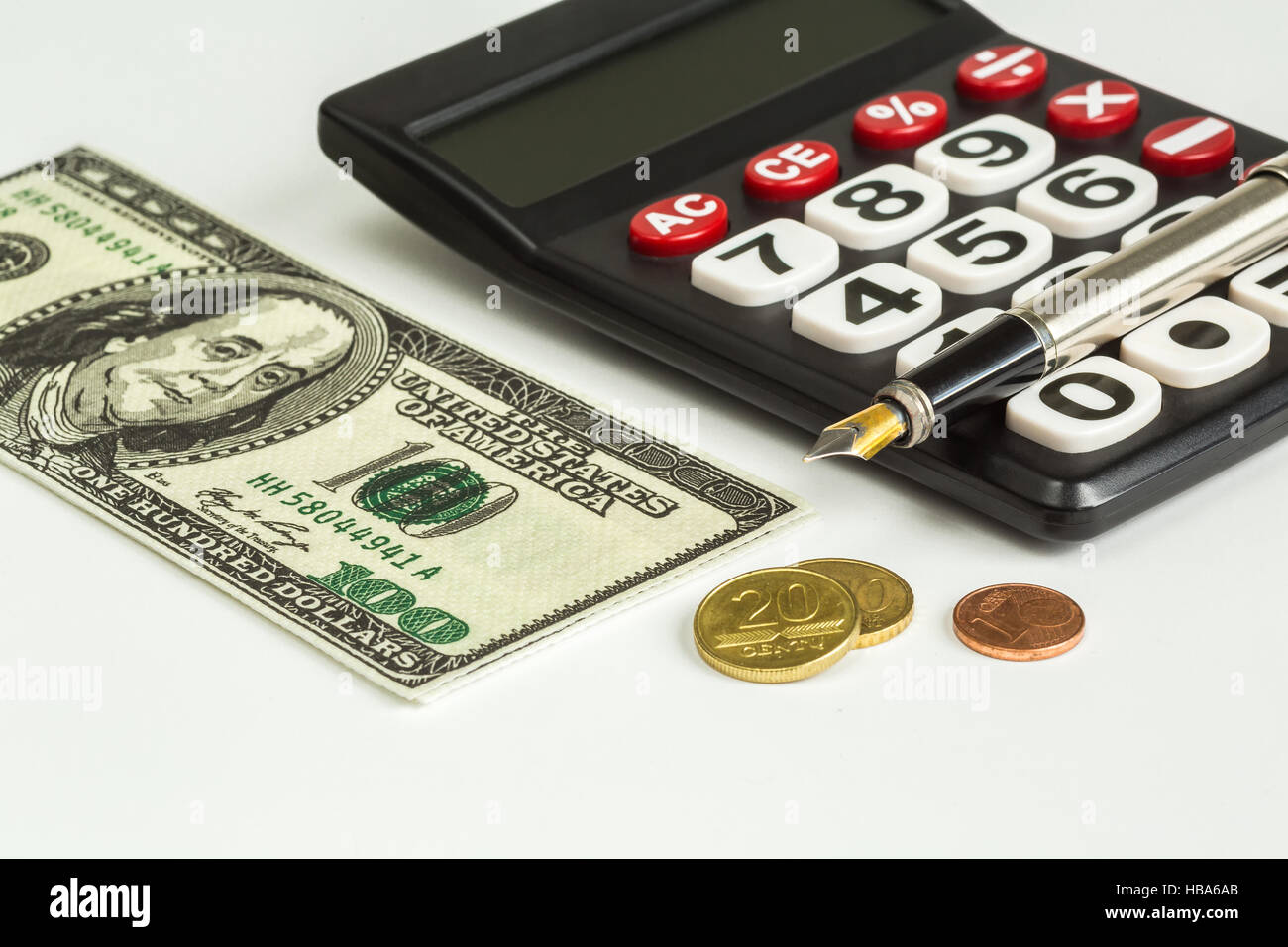 calculator; coins, pen Stock Photo - Alamy