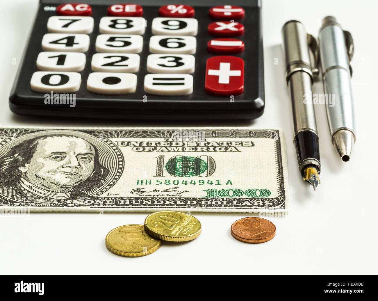 calculator; coins, pen Stock Photo - Alamy