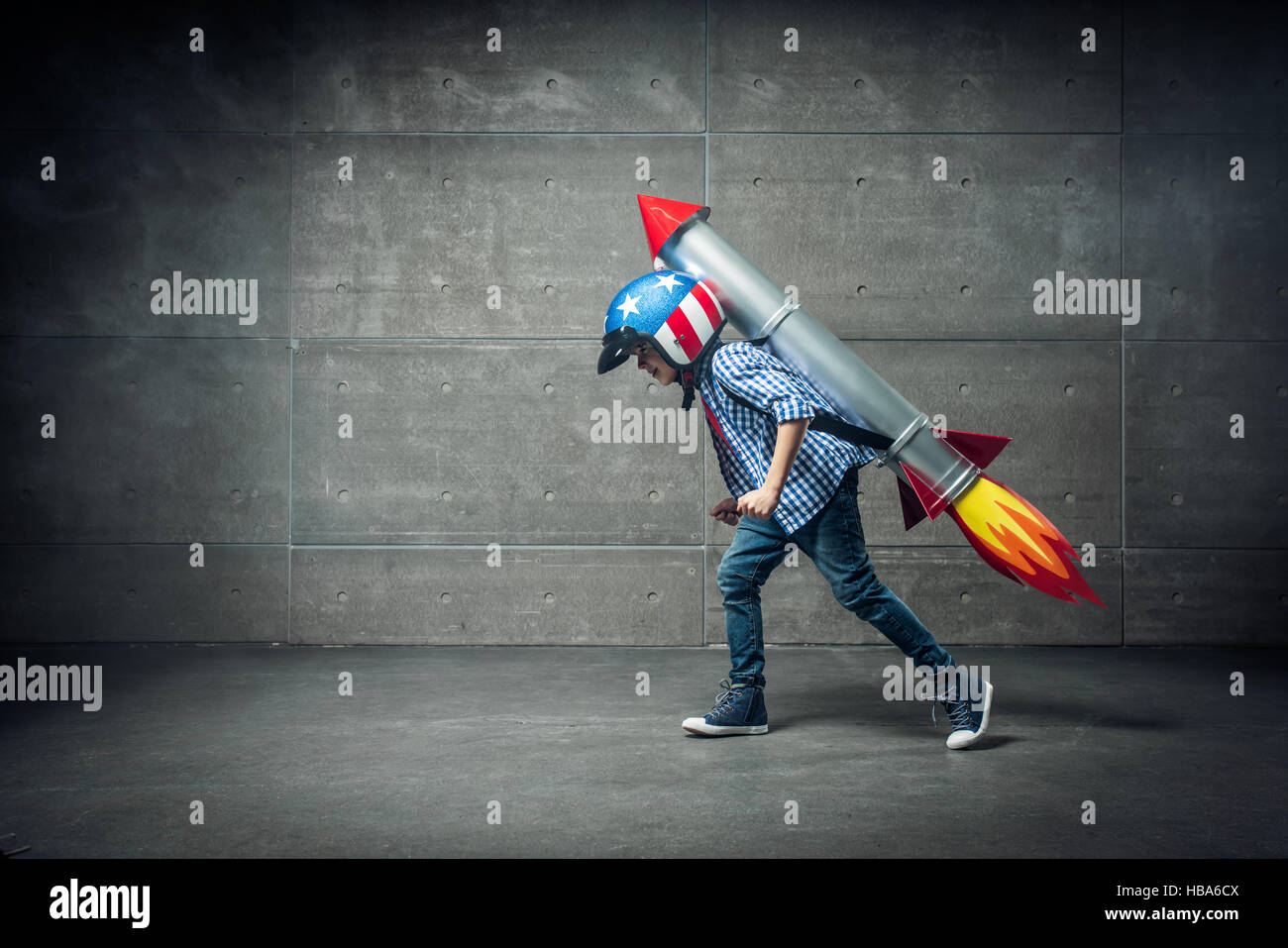 Boy with rocket Stock Photo - Alamy