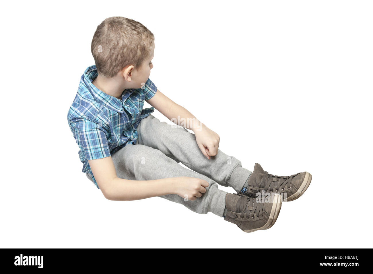 Boy looks inside his pants hi-res stock photography and images - Alamy