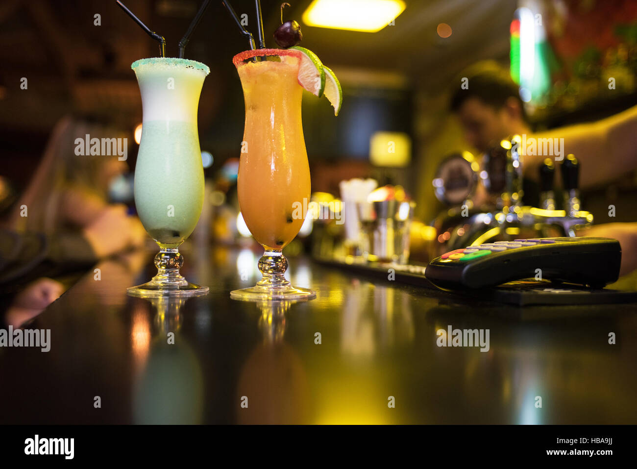 cocktails on bar background Stock Photo - Alamy