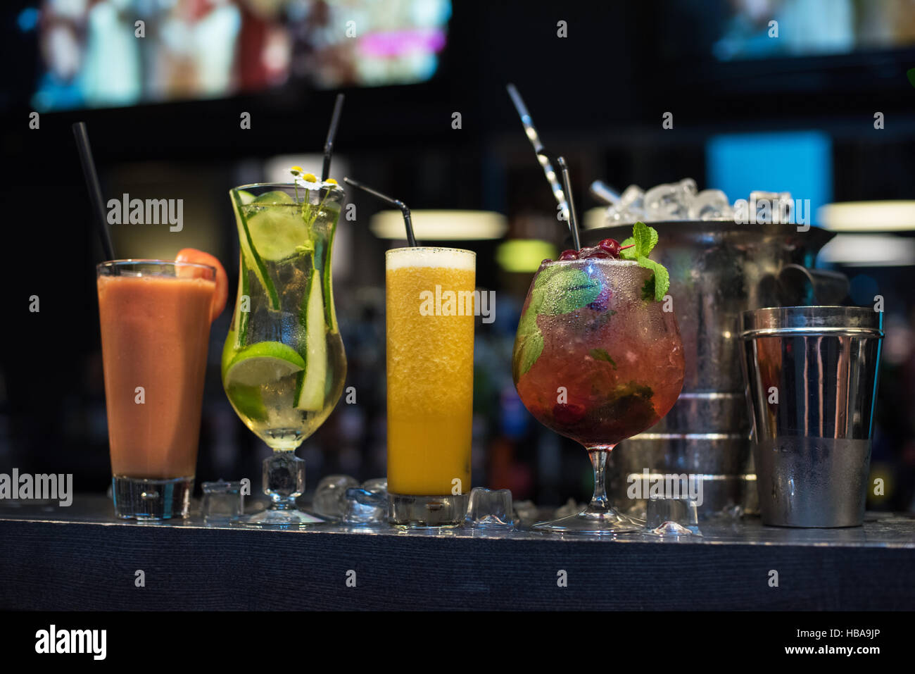 cocktails on bar background Stock Photo - Alamy