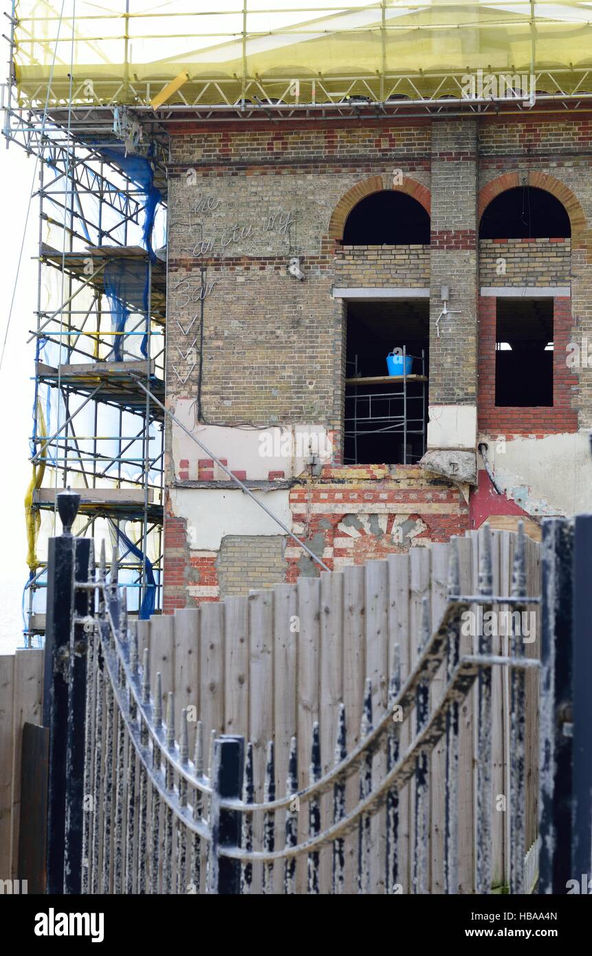 Old Building being restored with gate Stock Photo - Alamy