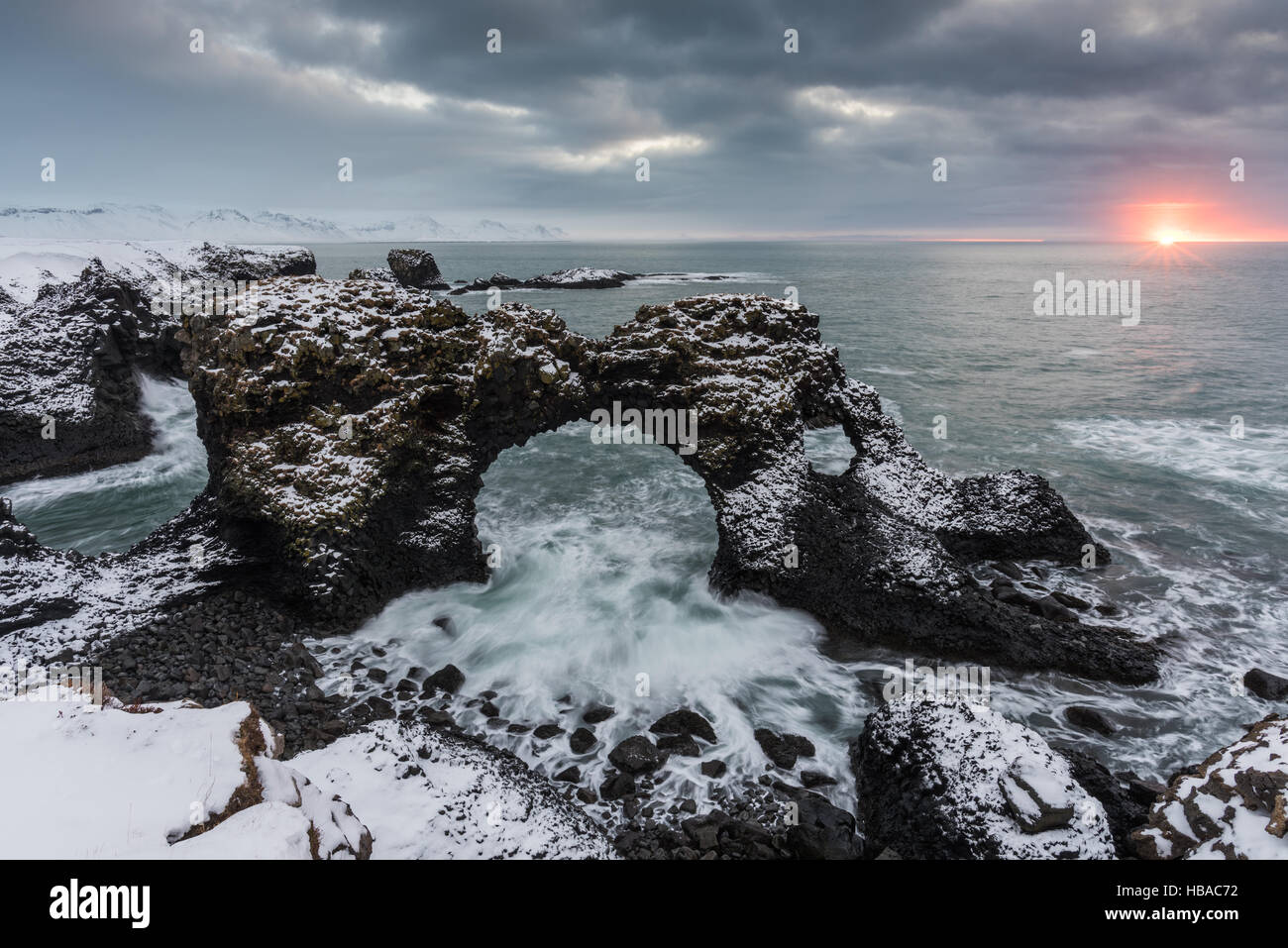 Rock Arnarstapi in Iceland at wintertime Stock Photo - Alamy