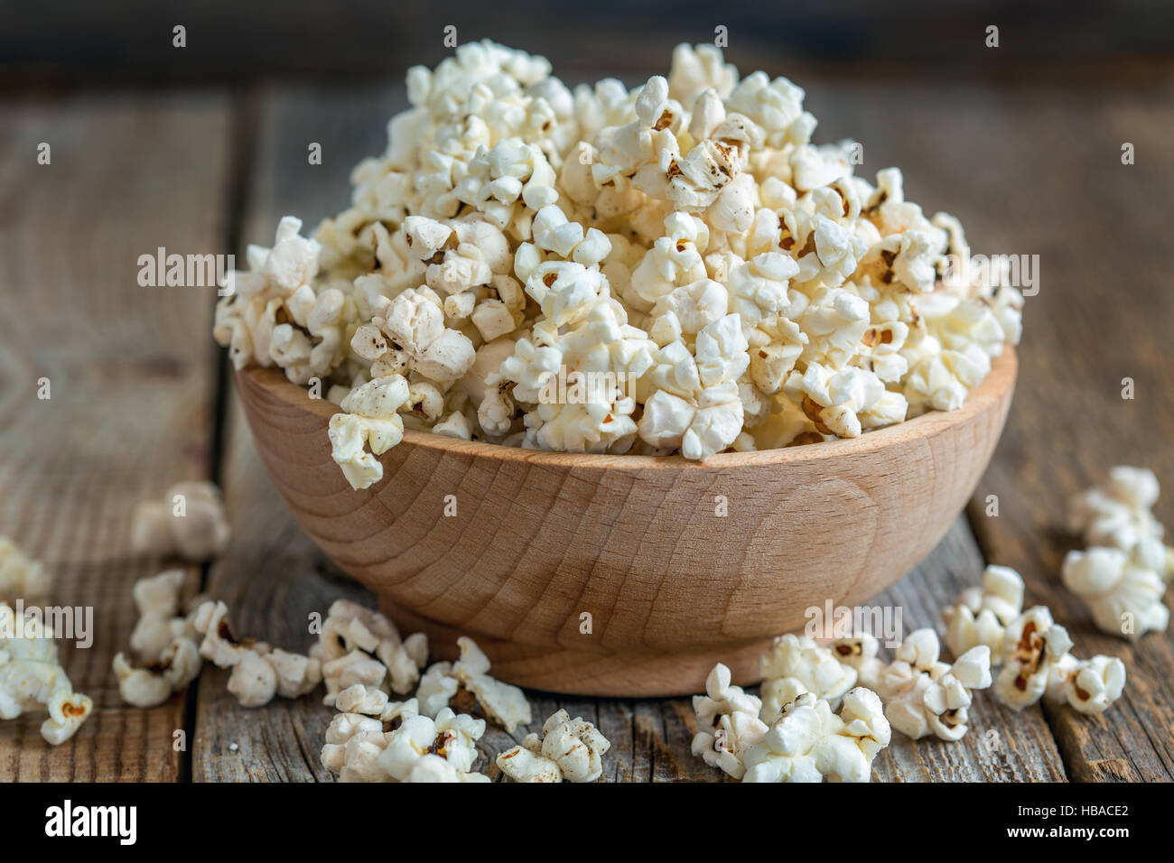Wooden bowl with popcorn closeup Stock Photo - Alamy