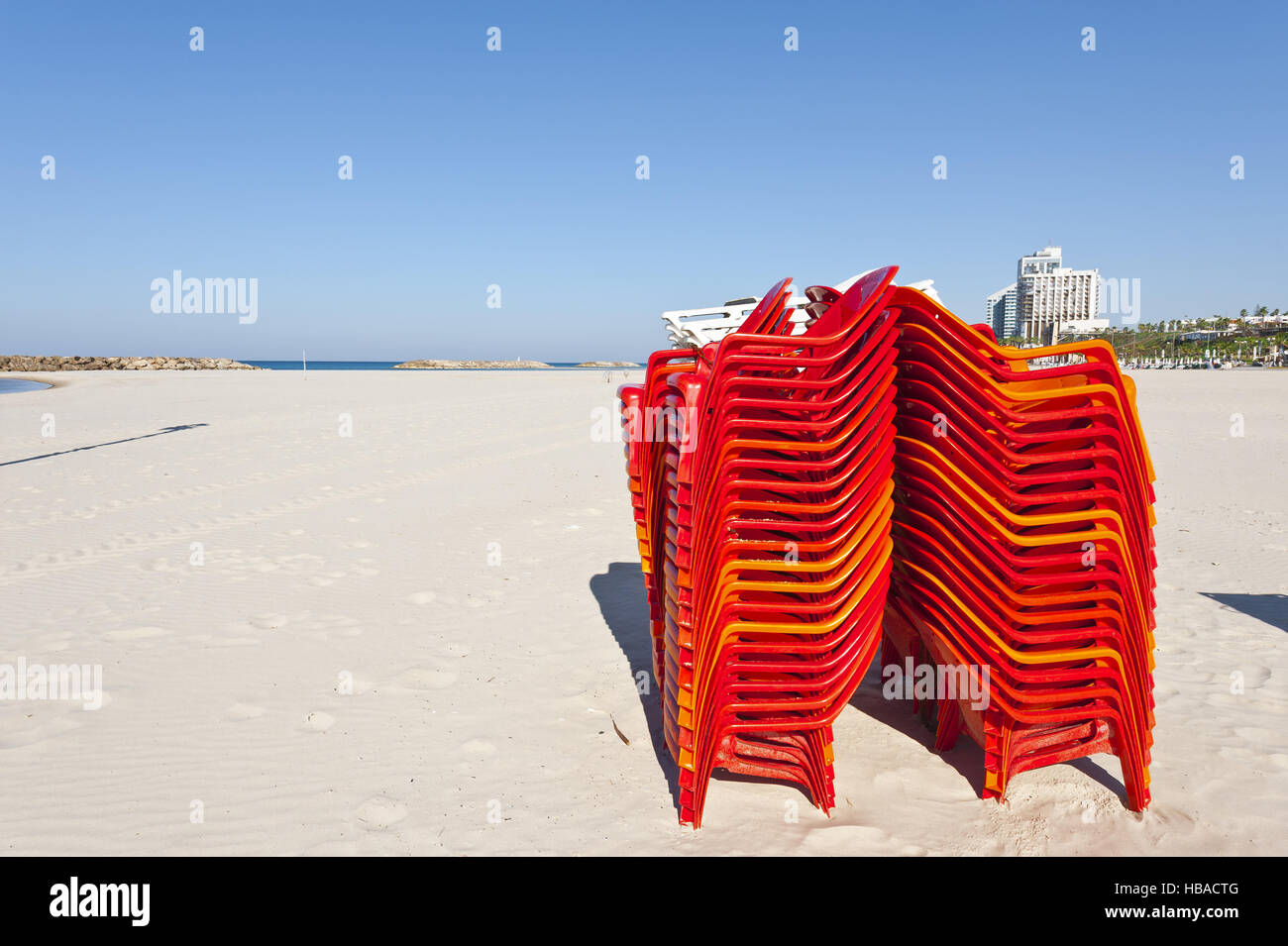 Plastic beach chairs hi-res stock photography and images - Alamy