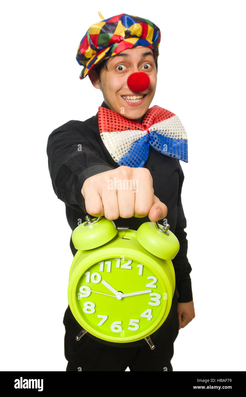 Funny clown with clock isolated on white Stock Photo - Alamy