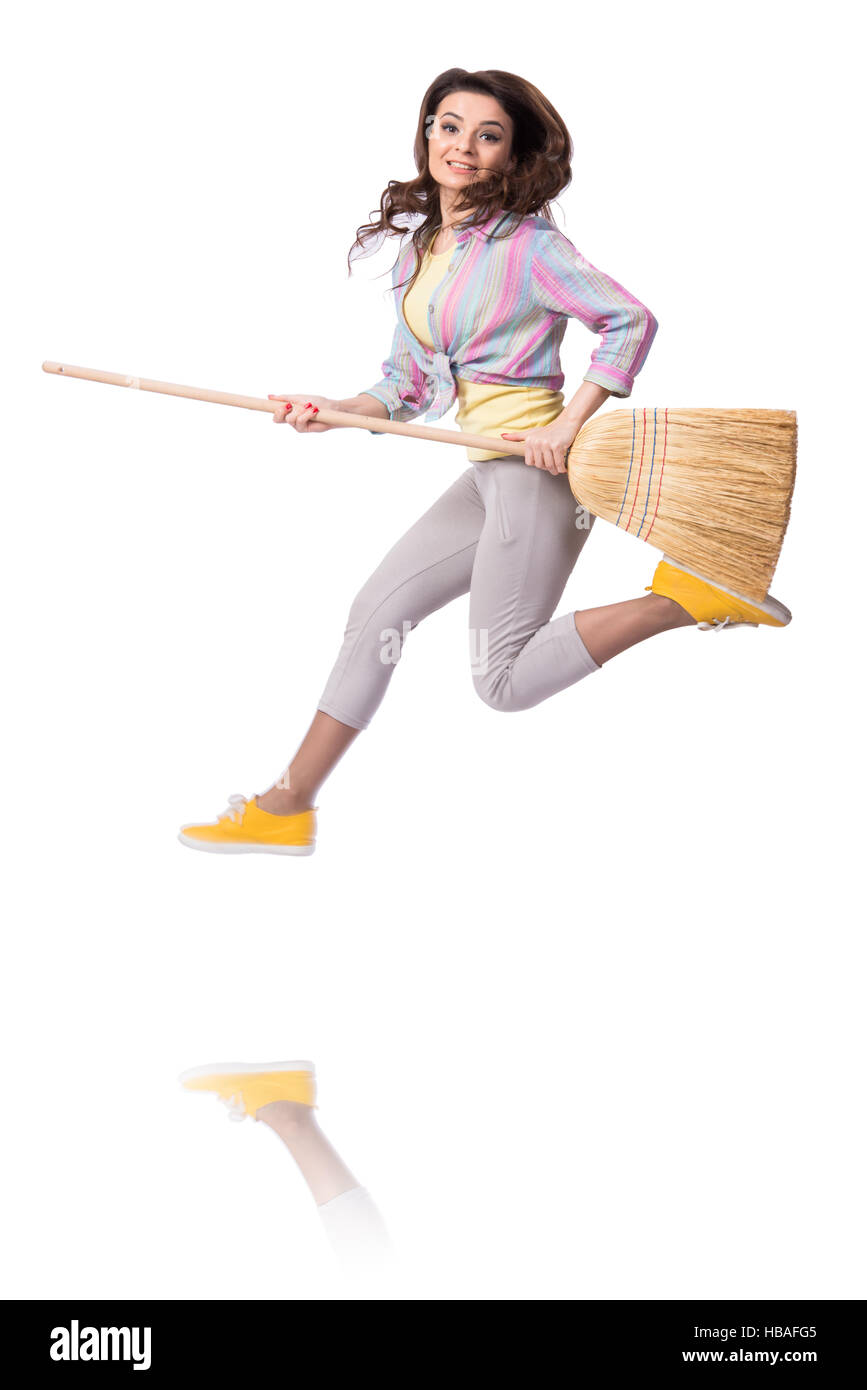 Woman sweeping floor isolated on white Stock Photo - Alamy