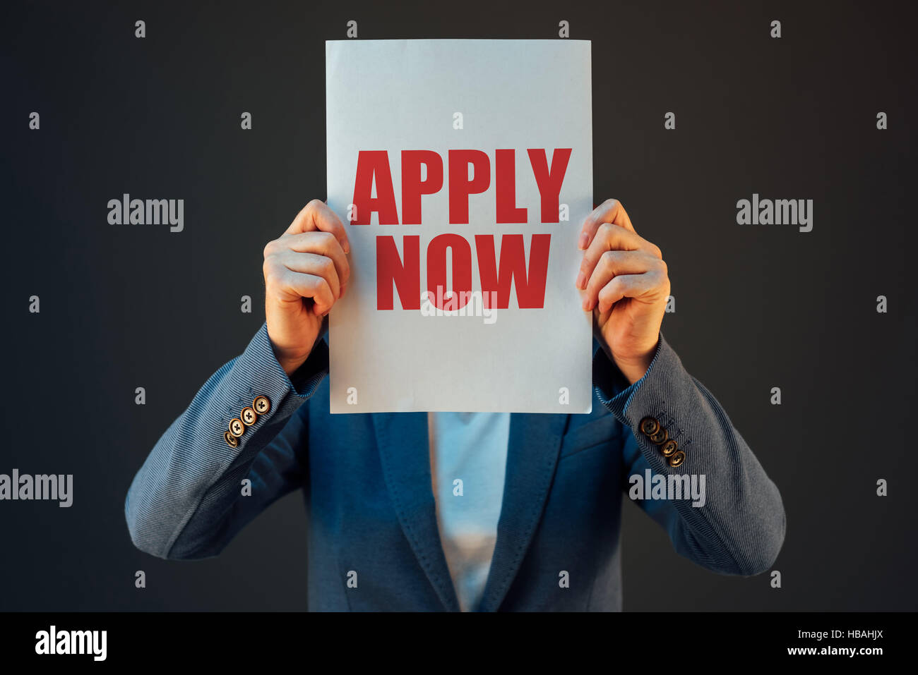 Holding apply hi-res stock photography and images - Alamy