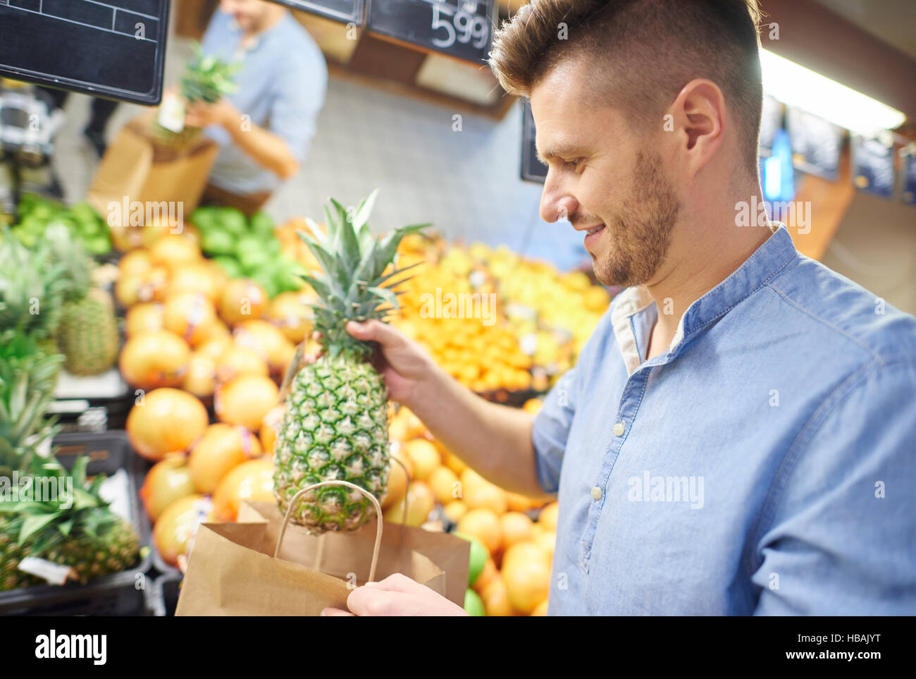 Buying fruit money hi-res stock photography and images - Alamy