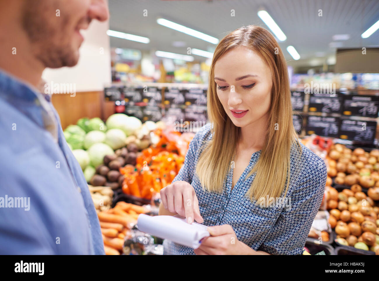 Focus woman with shopping list Stock Photo - Alamy Focus woman with shopping list Stock Photo - Alamy