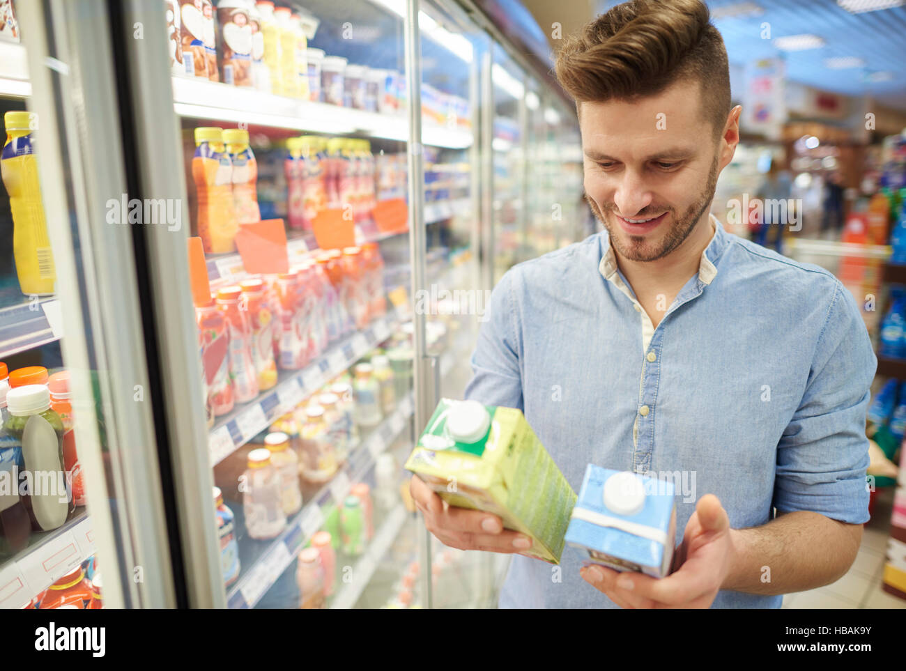Man making sure about the product Stock Photo - Alamy