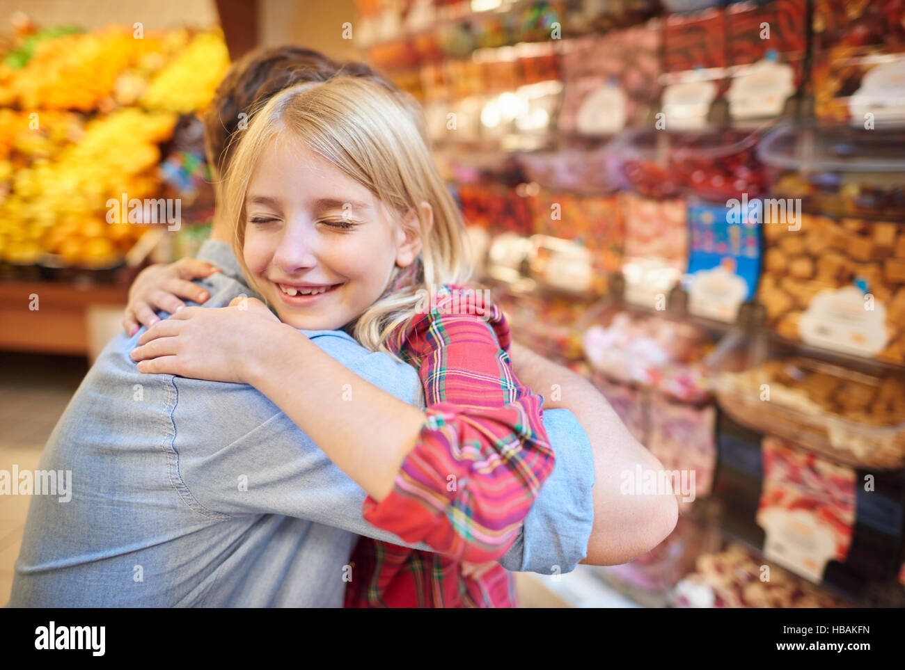 Happy daughter hugging her father Stock Photo - Alamy