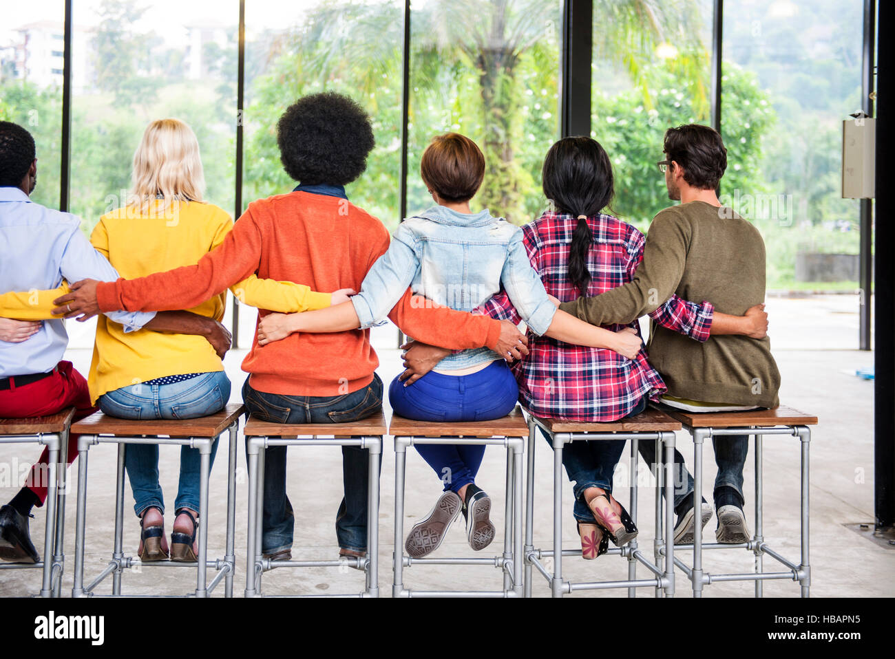 People Friendship Team Rear View Huddle Sitting Concept Stock Photo - Alamy