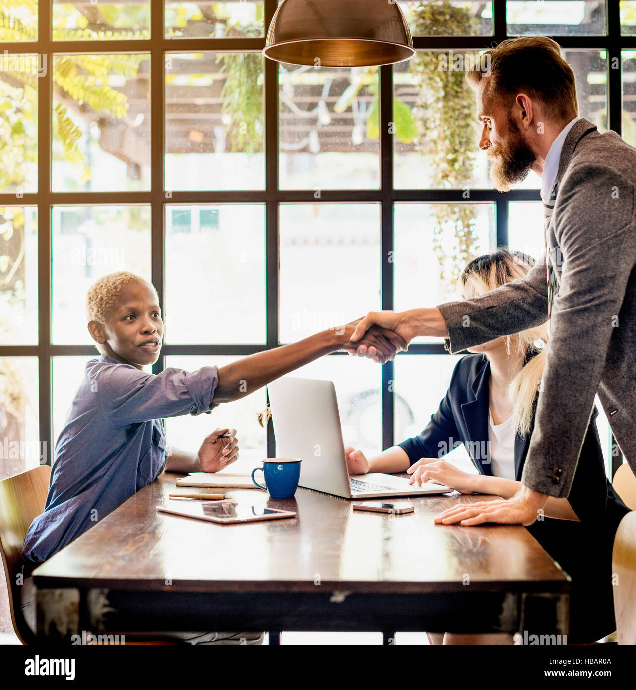 Multiethnic Business Partners Handshake Deal Team Concept Stock Photo ...