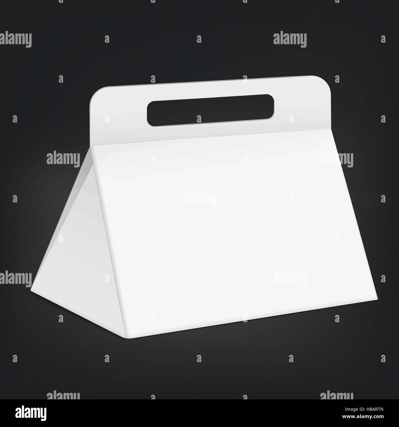 white triangle box with handle isolated on black background Stock ...