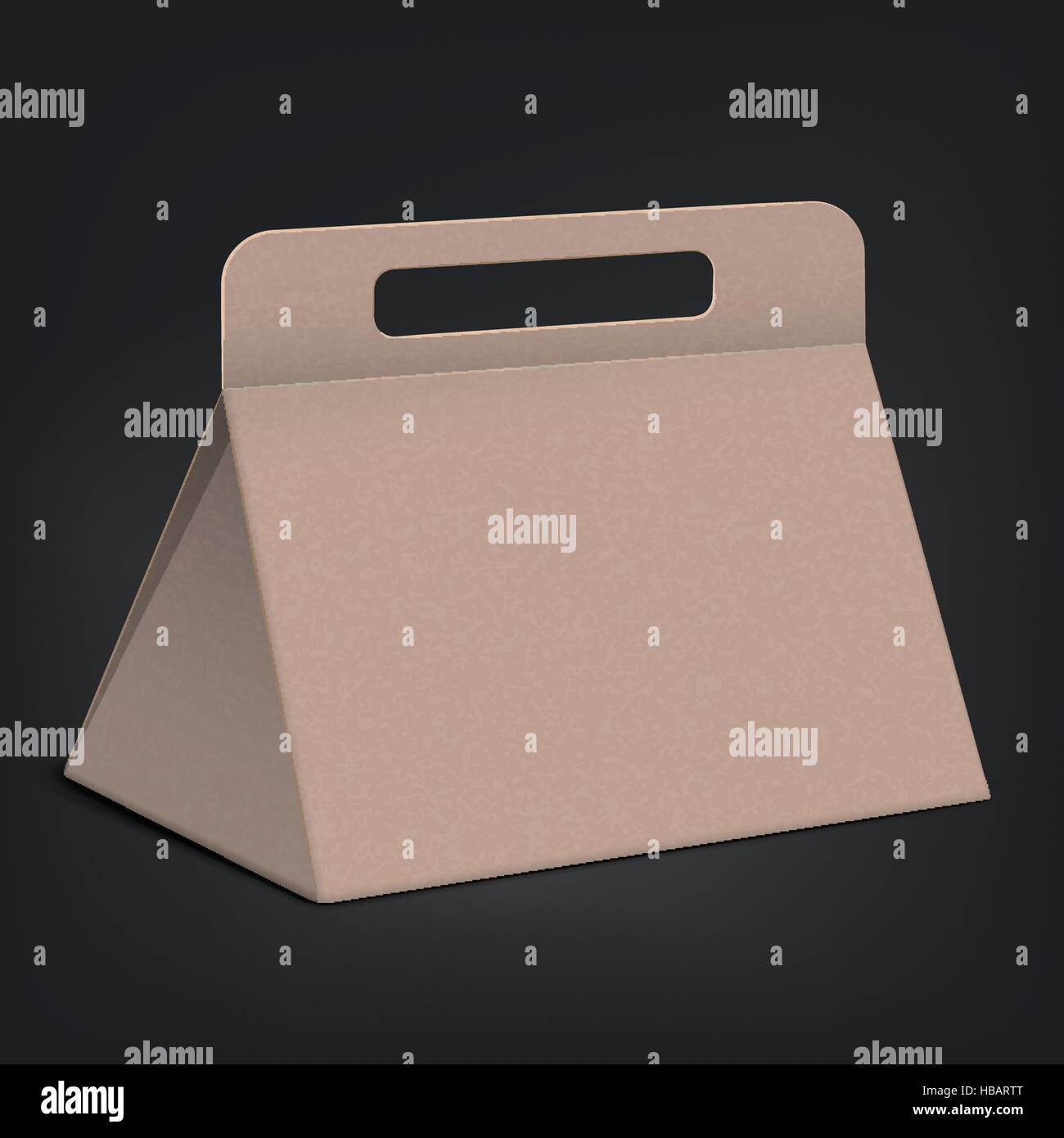 craft triangle box with handle isolated on black background Stock ...