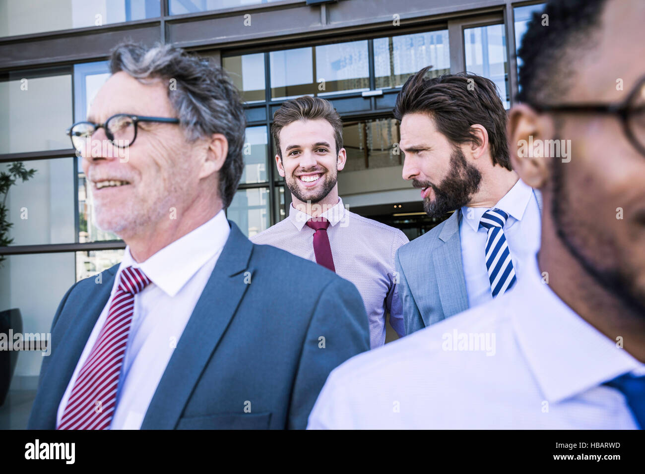 Group leaving building hi-res stock photography and images - Alamy