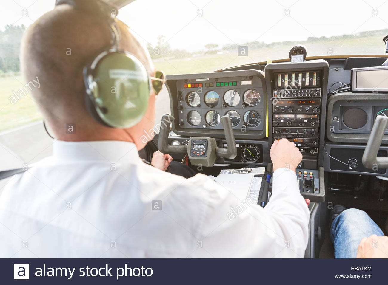 Pilot At Aircraft Controls Stock Photos & Pilot At Aircraft Controls ...