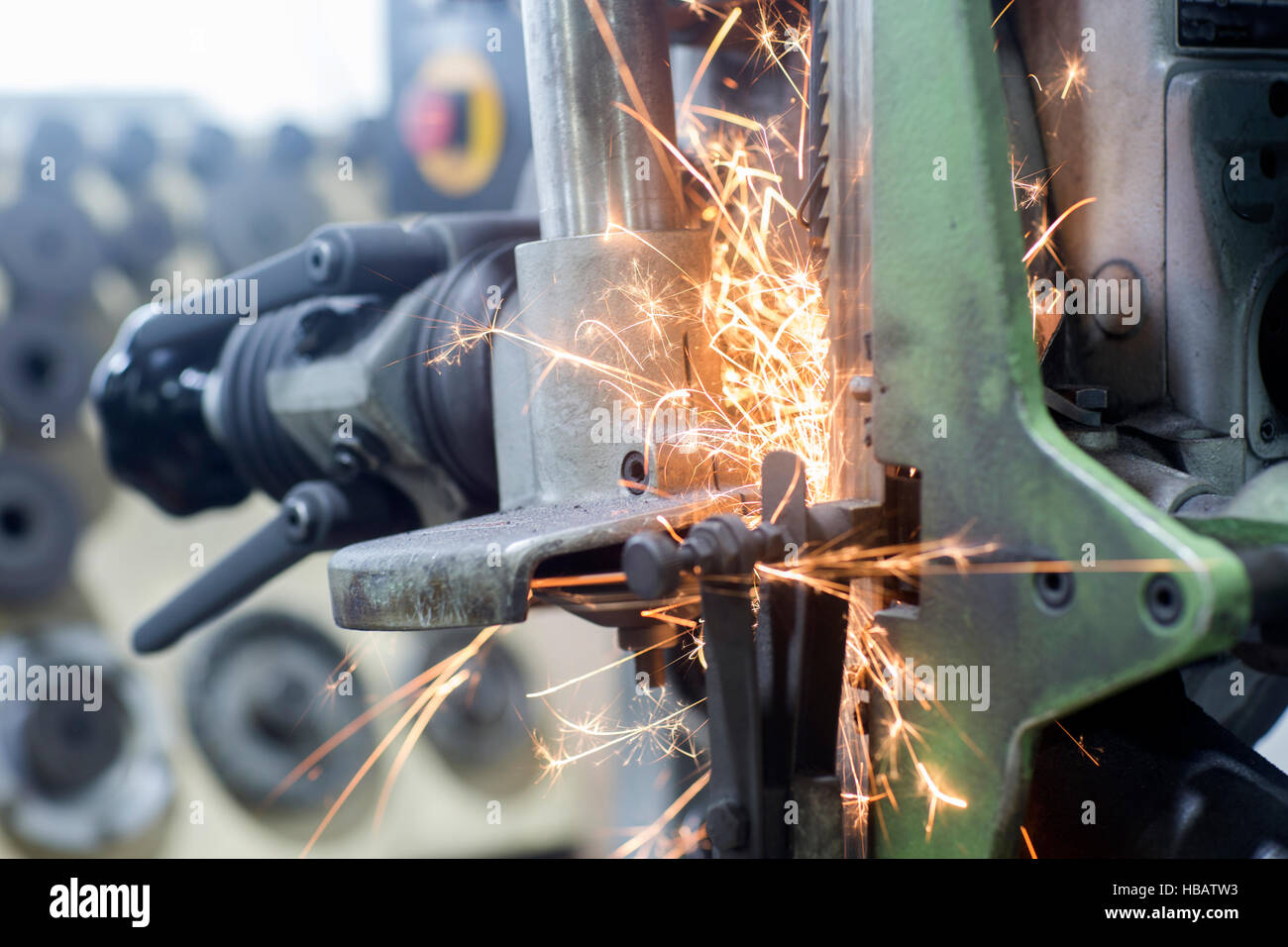 Sparks on grinding machine Stock Photo - Alamy