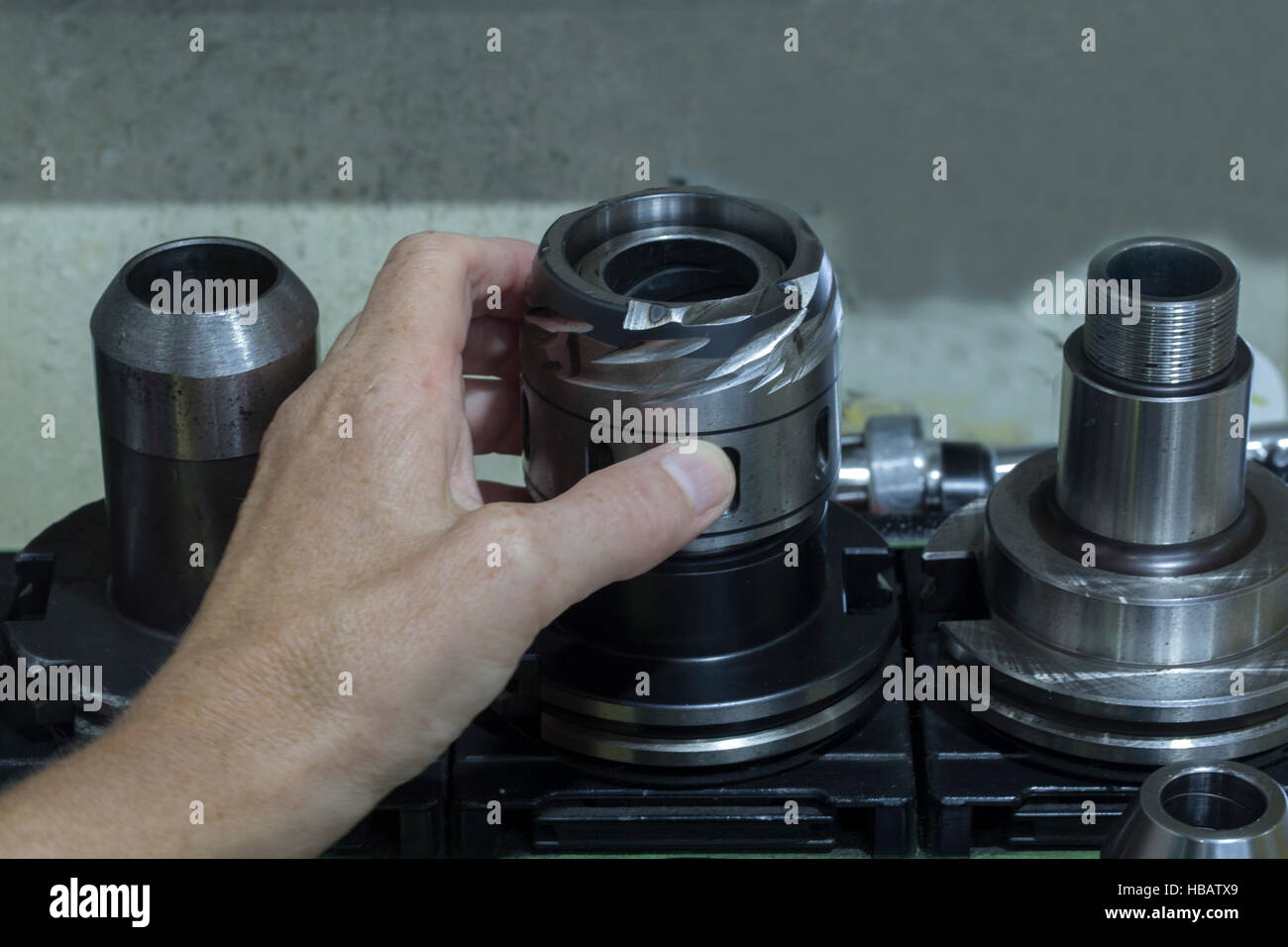 Man preparing grinding machine Stock Photo - Alamy